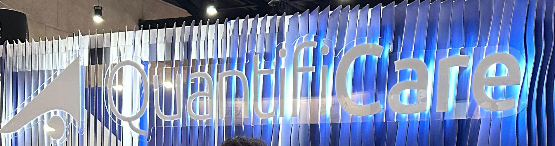 Cardboard booth for healthcare company. Quantificare at AAD